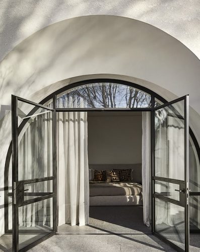 Deep arched windows evoke Italianate villa in Melbourne apartments by ...