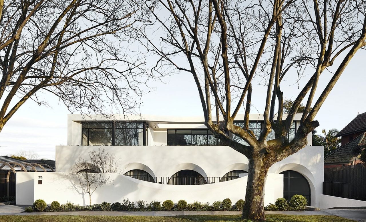 Deep arched windows evoke Italianate villa in Melbourne apartments by ...