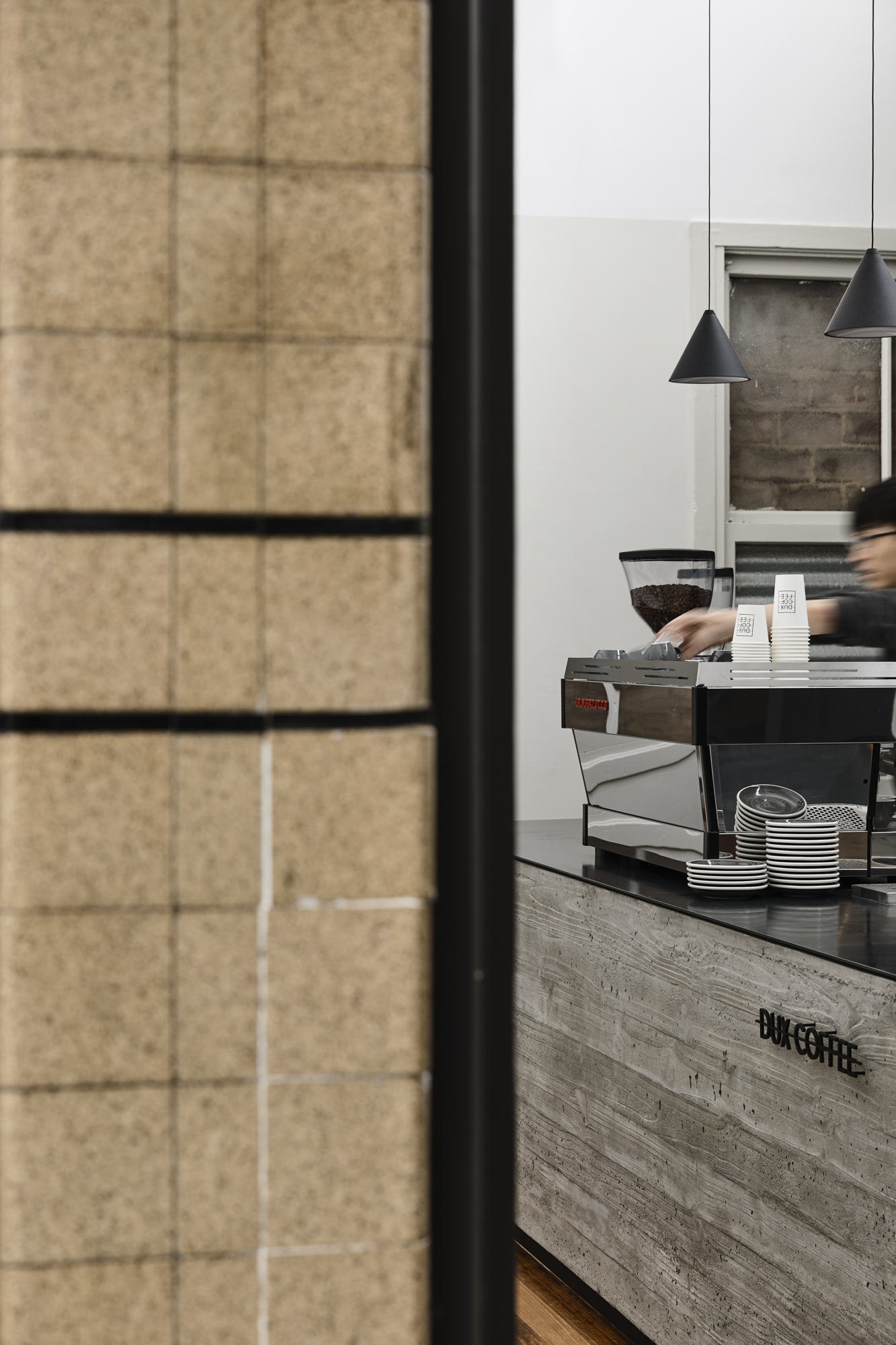 "Monolithic" concrete bar features in tiny coffee shop from Pierce ...