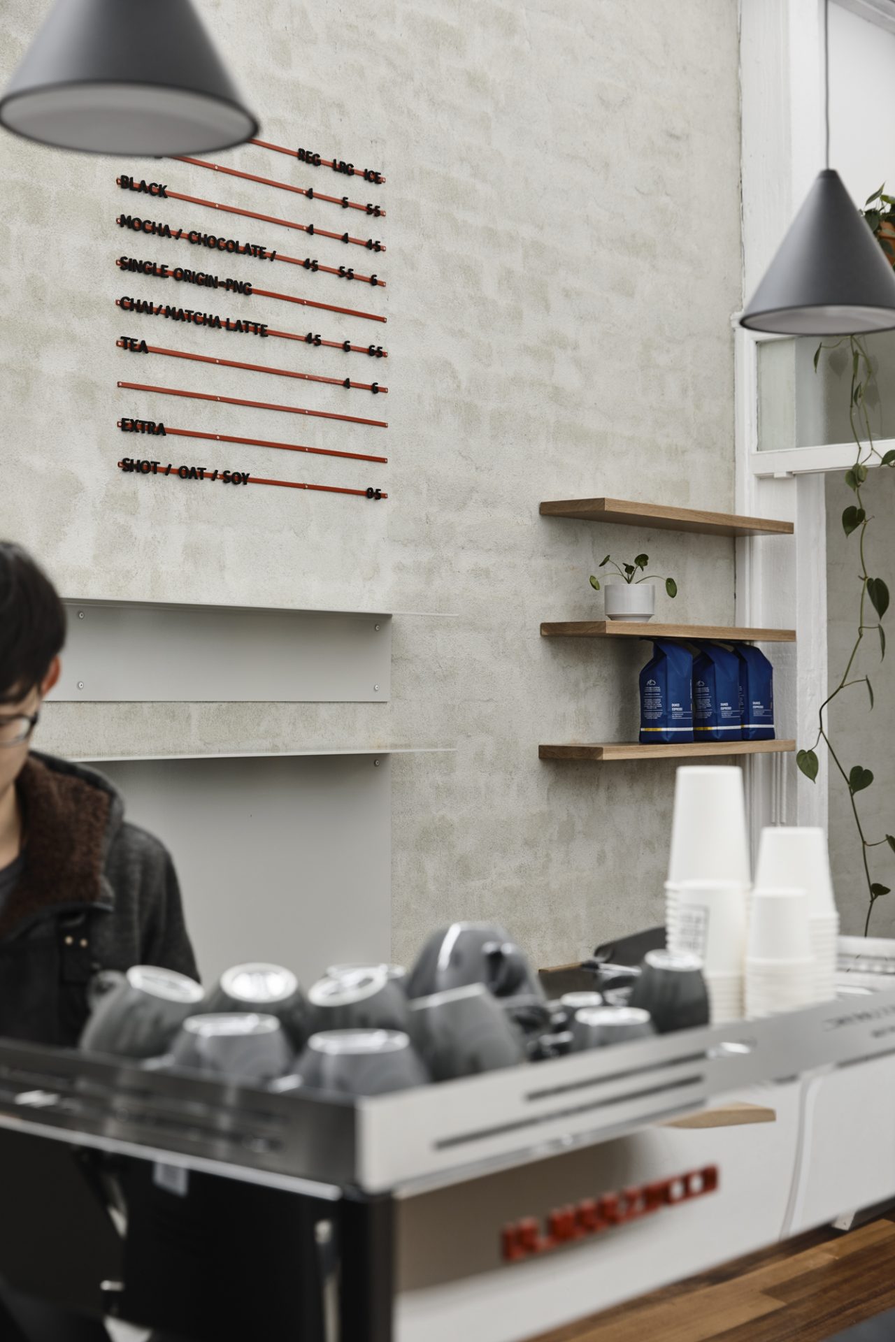 "Monolithic" concrete bar features in tiny coffee shop from Pierce ...