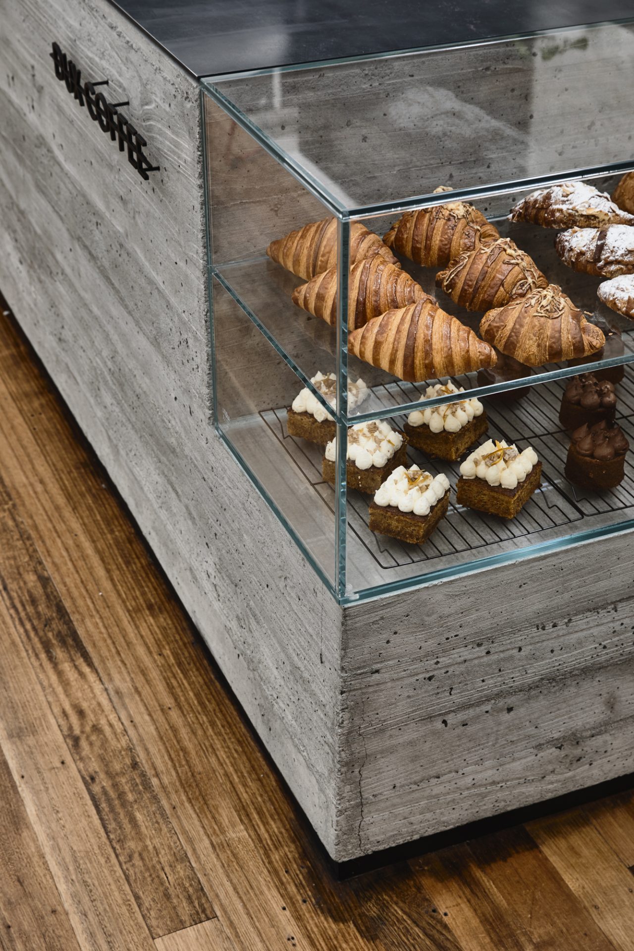 "Monolithic" concrete bar features in tiny coffee shop from Pierce ...